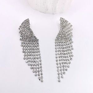 8 Other Reasons | Jewelry | Revolve Angel Wing Earrings Silver | Poshmark
